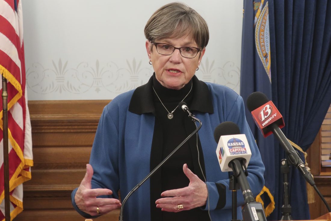 Kansas governor issues new mask mandate as COVID cases surge | News ...